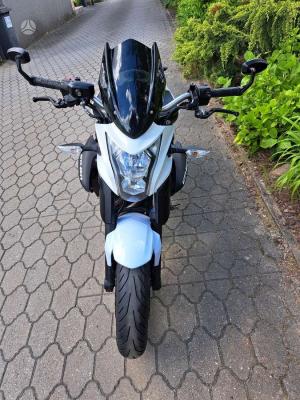 White Kawasaki ER 2014 in Pasvalys, with an engine capacity of 0.65 L and mileage of 39 thousand km for 3050 €, photo 4 on AUTOMOTO.COM.LV