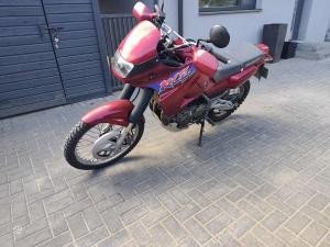 Красный Кавасаки KLE 1992 в Электренай, объемом двигателя 0.50 л и пробегом 44 тыс. км за 1200 €, фото  на AUTOMOTO.COM.LV