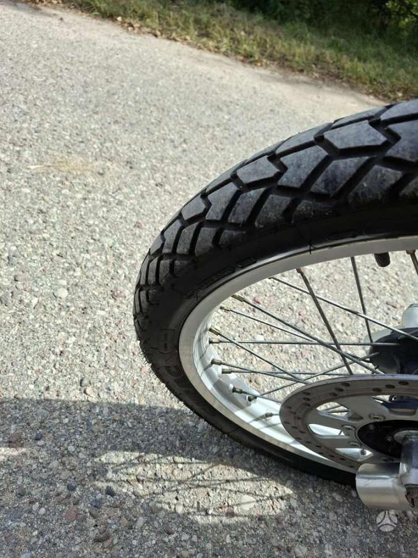 Sarkans Kawasaki KLE 1995 Marijampole, ar dzinēja tilpumu 0.50 L un nobraukumu 37 tūkst. km par 1990 €, foto 10 vietnē AUTOMOTO.COM.LV