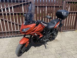 Red Kawasaki KLE 2016 in Vilnius, with an engine capacity of 0.65 L and mileage of 28 thousand km for 4900 €, photo  on AUTOMOTO.COM.LV