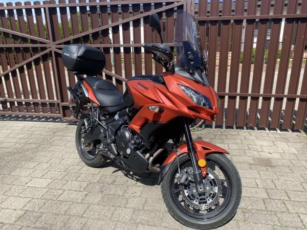 Red Kawasaki KLE 2016 in Vilnius, with an engine capacity of 0.65 L and mileage of 28 thousand km for 4900 €, photo 5 on AUTOMOTO.COM.LV