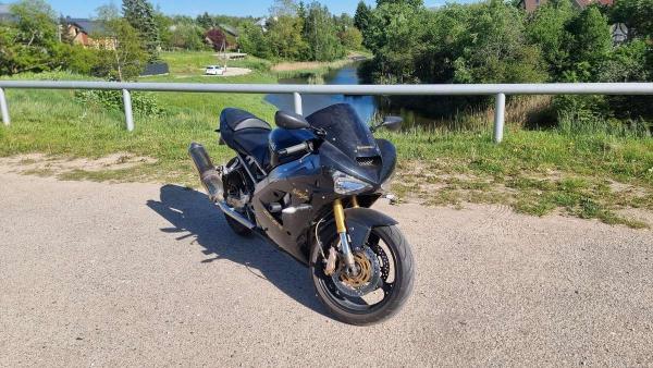 Melns Kawasaki Ninja 2004 Kauņa, ar dzinēja tilpumu 0.60 L un nobraukumu 72 tūkst. km par 2600 €, foto 1 vietnē AUTOMOTO.COM.LV