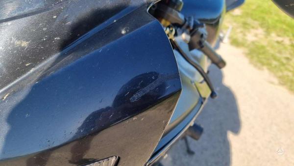 Melns Kawasaki Ninja 2004 Kauņa, ar dzinēja tilpumu 0.60 L un nobraukumu 72 tūkst. km par 2600 €, foto 3 vietnē AUTOMOTO.COM.LV
