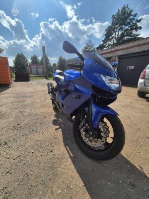 Zils Kawasaki Ninja 1999 Prienai, ar dzinēja tilpumu 0.90 L un nobraukumu 39 tūkst. km par 1900 €, foto 4 vietnē AUTOMOTO.COM.LV