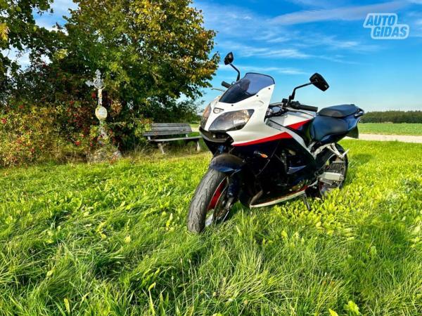 Blue Kawasaki Ninja 2000 in Kaisiadorys, with an engine capacity of 0.90 L and mileage of 50 thousand km for 2500 €, photo 1 on AUTOMOTO.COM.LV