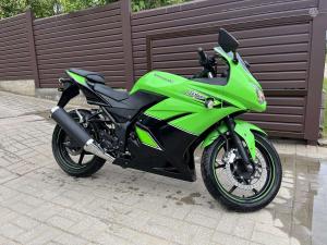 Green Kawasaki Ninja 2012 in Vilnius, with an engine capacity of 0.25 L and mileage of 20 thousand km for 1500 €, photo 1 on AUTOMOTO.COM.LV