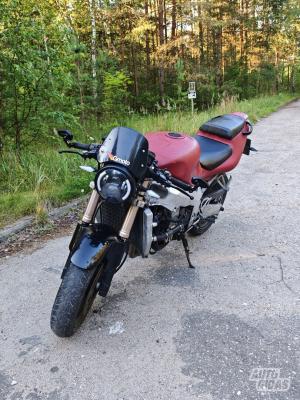 Sarkans Kawasaki Ninja 1998 Akmenė, ar dzinēja tilpumu 0.75 L un nobraukumu 43 tūkst. km par 450 €, foto  vietnē AUTOMOTO.COM.LV