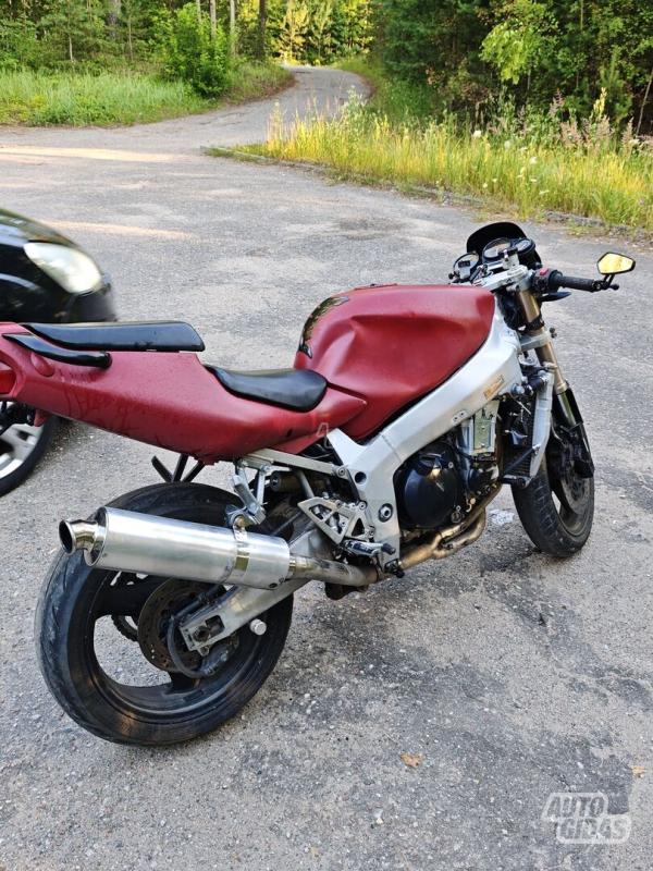 Red Kawasaki Ninja 1998 in Akmene, with an engine capacity of 0.75 L and mileage of 43 thousand km for 450 €, photo 3 on AUTOMOTO.COM.LV