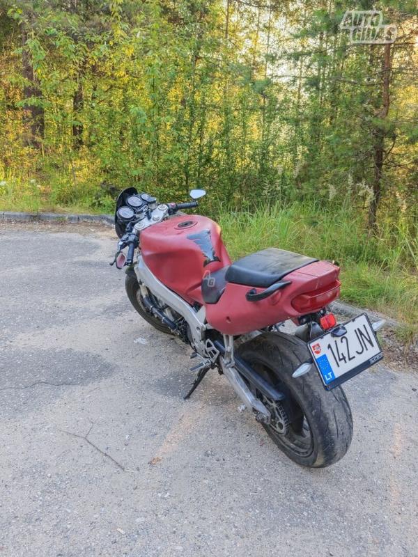 Red Kawasaki Ninja 1998 in Akmene, with an engine capacity of 0.75 L and mileage of 43 thousand km for 450 €, photo 4 on AUTOMOTO.COM.LV
