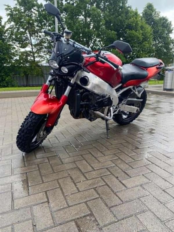 Sarkans Kawasaki Ninja 1998 Telšiai, ar dzinēja tilpumu 0.90 L un nobraukumu 18 tūkst. km par 1400 €, foto 1 vietnē AUTOMOTO.COM.LV