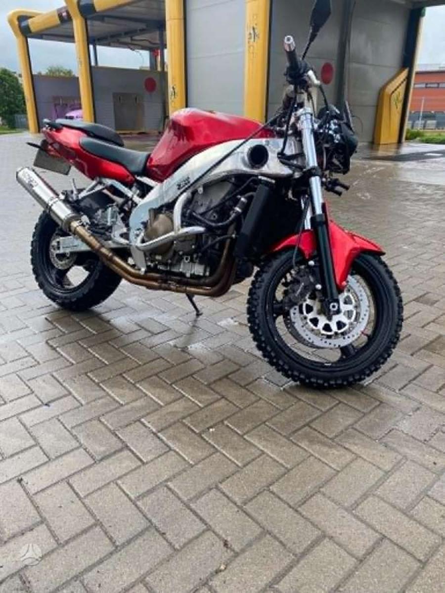 Sarkans Kawasaki Ninja 1998 Telšiai, ar dzinēja tilpumu 0.90 L un nobraukumu 18 tūkst. km par 1400 €, foto 4 vietnē AUTOMOTO.COM.LV