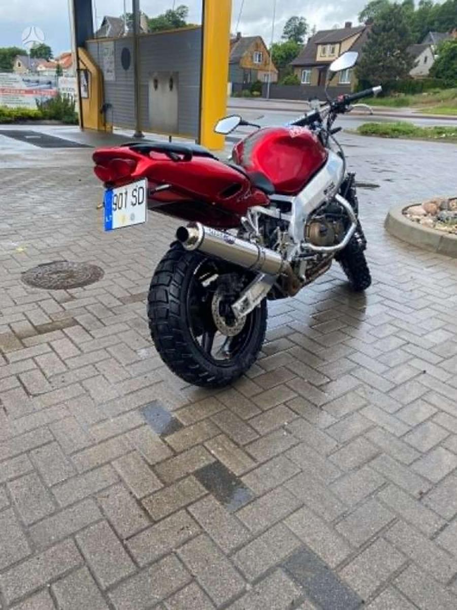 Sarkans Kawasaki Ninja 1998 Telšiai, ar dzinēja tilpumu 0.90 L un nobraukumu 18 tūkst. km par 1400 €, foto 5 vietnē AUTOMOTO.COM.LV