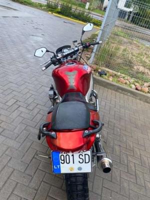 Sarkans Kawasaki Ninja 1998 Telšiai, ar dzinēja tilpumu 0.90 L un nobraukumu 18 tūkst. km par 1400 €, foto 6 vietnē AUTOMOTO.COM.LV