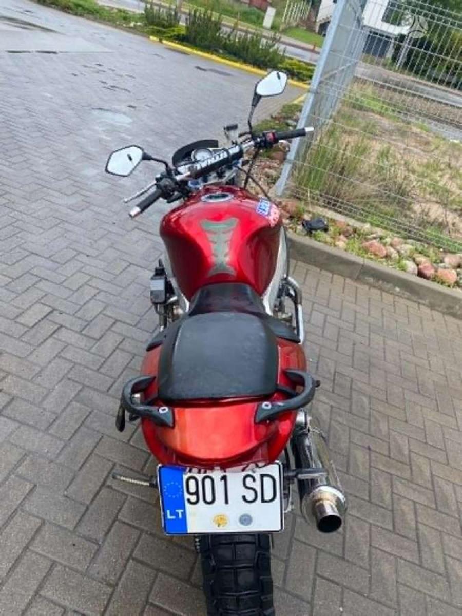 Sarkans Kawasaki Ninja 1998 Telšiai, ar dzinēja tilpumu 0.90 L un nobraukumu 18 tūkst. km par 1400 €, foto 6 vietnē AUTOMOTO.COM.LV