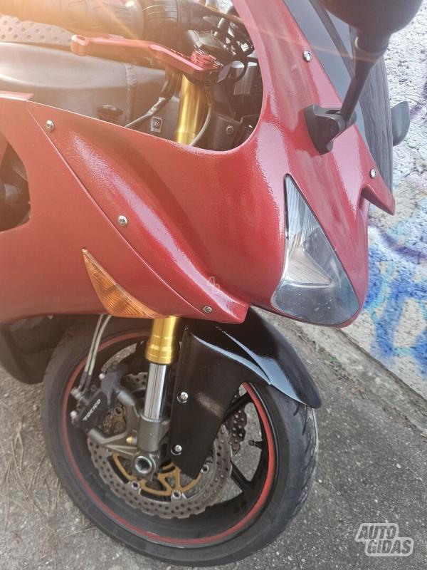 Sarkans Kawasaki Ninja 2006 Viļņa, ar dzinēja tilpumu 0.64 L un nobraukumu 54 tūkst. km par 3100 €, foto 4 vietnē AUTOMOTO.COM.LV