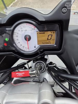Melns Kawasaki Versys 650 2011 Panevēža, ar dzinēja tilpumu 0.65 L un nobraukumu 42 tūkst. km par 3600 €, foto 10 vietnē AUTOMOTO.COM.LV