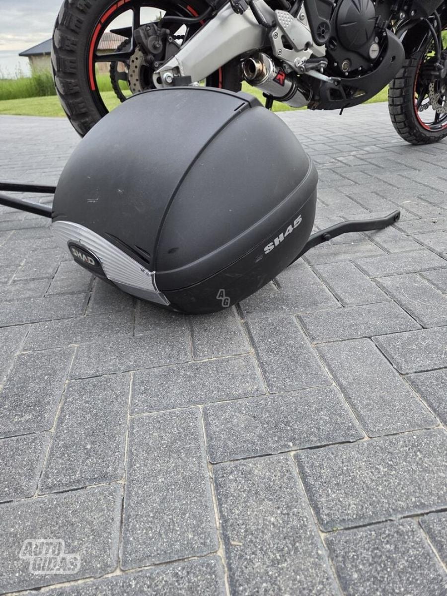 Melns Kawasaki Versys 650 2011 Panevēža, ar dzinēja tilpumu 0.65 L un nobraukumu 42 tūkst. km par 3600 €, foto 15 vietnē AUTOMOTO.COM.LV