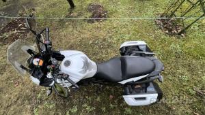 White Kawasaki Versys 650 2018 in Tallinn, with an engine capacity of 0.65 L and mileage of 31 thousand km for 7250 €, photo 12 on AUTOMOTO.COM.LV