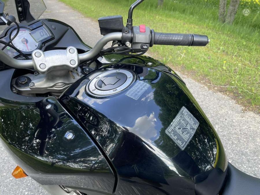 Melns Kawasaki Versys 2007 Anykščiai, ar dzinēja tilpumu 0.65 L un nobraukumu 33 tūkst. km par 2650 €, foto 15 vietnē AUTOMOTO.COM.LV