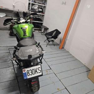 Green Kawasaki Versys 2008 in Kelme, with an engine capacity of 0.65 L and mileage of 43 thousand km for 2500 €, photo 3 on AUTOMOTO.COM.LV