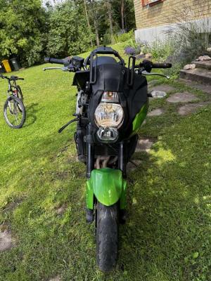 Zaļš Kawasaki Versys 2014 Biržai, ar dzinēja tilpumu 1.04 L un nobraukumu 56 tūkst. km par 3300 €, foto 3 vietnē AUTOMOTO.COM.LV