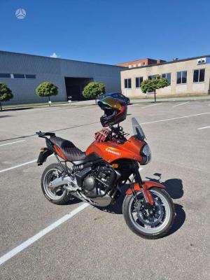 Red Kawasaki Versys 2007 in Kaunas, with an engine capacity of 0.65 L and mileage of 47 thousand km for 3100 €, photo 3 on AUTOMOTO.COM.LV