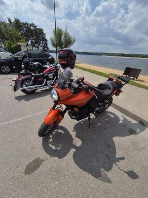 Red Kawasaki Versys 2007 in Kaunas, with an engine capacity of 0.65 L and mileage of 47 thousand km for 3100 €, photo 5 on AUTOMOTO.COM.LV