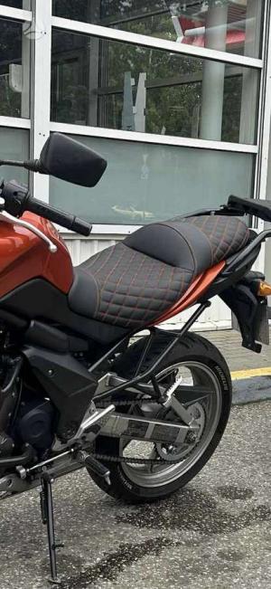 Red Kawasaki Versys 2007 in Kaunas, with an engine capacity of 0.65 L and mileage of 47 thousand km for 3100 €, photo 8 on AUTOMOTO.COM.LV