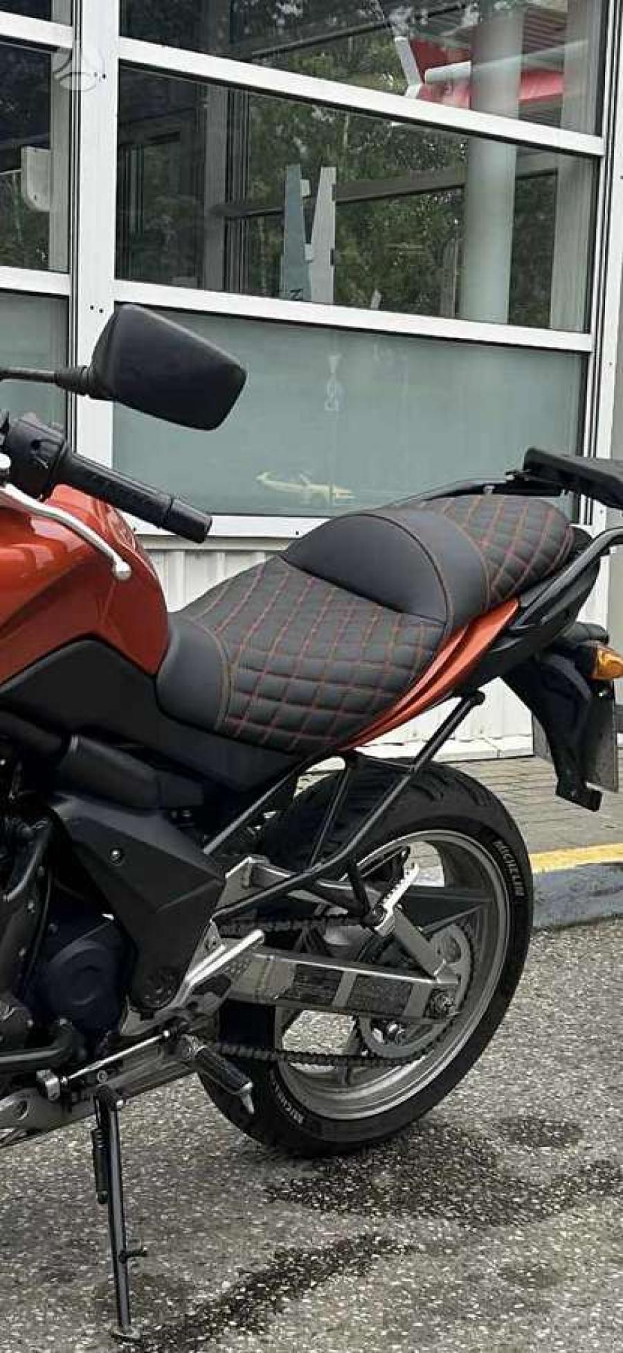 Red Kawasaki Versys 2007 in Kaunas, with an engine capacity of 0.65 L and mileage of 47 thousand km for 3100 €, photo 8 on AUTOMOTO.COM.LV