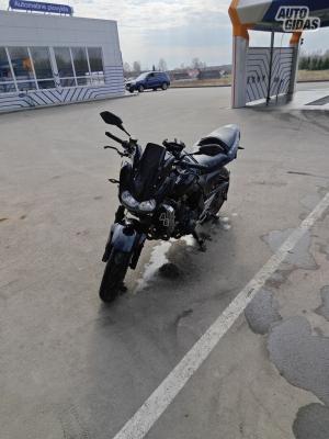 Melns Kawasaki Z 2004 Viļņa, ar dzinēja tilpumu 0.75 L un nobraukumu 43 tūkst. km par 2500 €, foto  vietnē AUTOMOTO.COM.LV