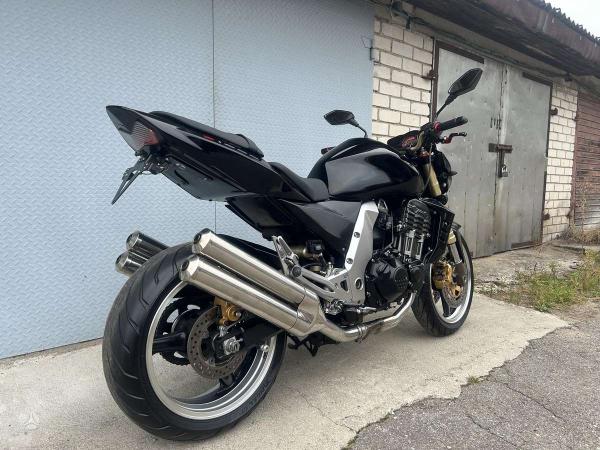 Черный Кавасаки Z 2004 в Бирштонас, объемом двигателя 1.00 л и пробегом 42 тыс. км за 2999 €, фото 7 на AUTOMOTO.COM.LV