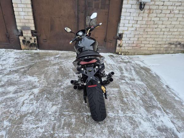 Black Kawasaki Z 2005 in Alytus, with an engine capacity of 1.00 L and mileage of 32 thousand km for 2970 €, photo 11 on AUTOMOTO.COM.LV