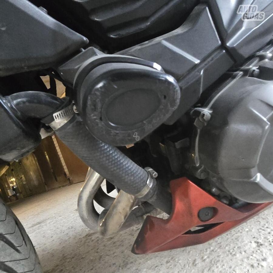 Black Kawasaki Z 2014 in Kaunas, with an engine capacity of 0.80 L and mileage of 24 thousand km for 3800 €, photo 5 on AUTOMOTO.COM.LV