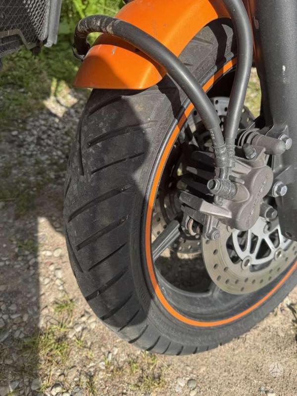 Orange Kawasaki Z 2006 in Vilnius, with an engine capacity of 0.75 L and mileage of 46 thousand km for 2800 €, photo 10 on AUTOMOTO.COM.LV