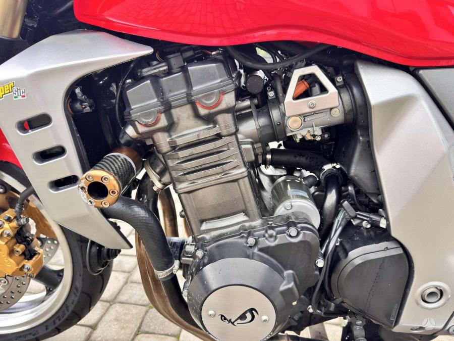 Red Kawasaki Z 2004 in Vilnius, with an engine capacity of 1.00 L and mileage of 41 thousand km for 2590 €, photo 11 on AUTOMOTO.COM.LV