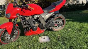 Red Kawasaki Z 2004 in Kaunas, with an engine capacity of 0.75 L and mileage of 55 thousand km for 1800 €, photo  on AUTOMOTO.COM.LV