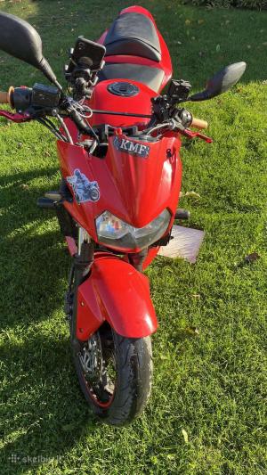 Red Kawasaki Z 2004 in Kaunas, with an engine capacity of 0.75 L and mileage of 55 thousand km for 1800 €, photo 12 on AUTOMOTO.COM.LV