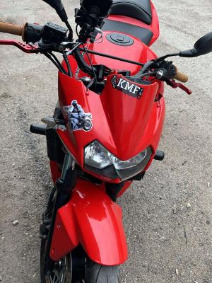 Red Kawasaki Z 2004 in Kaunas, with an engine capacity of 0.75 L and mileage of 55 thousand km for 1800 €, photo 14 on AUTOMOTO.COM.LV