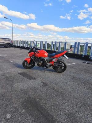 Red Kawasaki Z 2005 in Vilnius, with an engine capacity of 0.75 L and mileage of 56 thousand km for 2299 €, photo  on AUTOMOTO.COM.LV