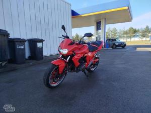 Красный Кавасаки Z 2006 в Шилале, объемом двигателя 0.75 л и пробегом 46 тыс. км за 2100 €, фото 3 на AUTOMOTO.COM.LV