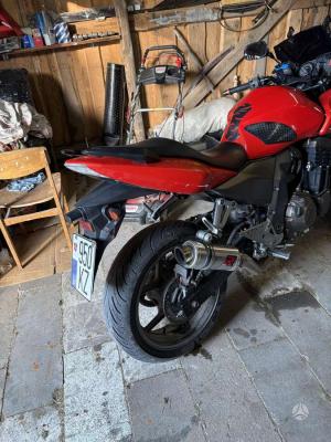 Красный Кавасаки Z 2006 в Паневежис, объемом двигателя 0.75 л и пробегом 62 тыс. км за 1850 €, фото 7 на AUTOMOTO.COM.LV