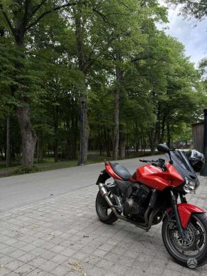 Красный Кавасаки Z 2006 в Паневежис, объемом двигателя 0.75 л и пробегом 62 тыс. км за 1850 €, фото 8 на AUTOMOTO.COM.LV