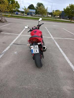 Red Kawasaki Z 2006 in Mazeikiai, with an engine capacity of 0.75 L and mileage of 47 thousand km for 2500 €, photo 3 on AUTOMOTO.COM.LV