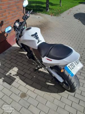 White Kawasaki Z 2004 in Kaunas, with an engine capacity of 0.95 L and mileage of 51 thousand km for 3000 €, photo 15 on AUTOMOTO.COM.LV