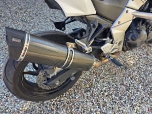 White Kawasaki Z 2009 in Pasvalys, with an engine capacity of 0.75 L and mileage of 60 thousand km for 1199 €, photo 22 on AUTOMOTO.COM.LV