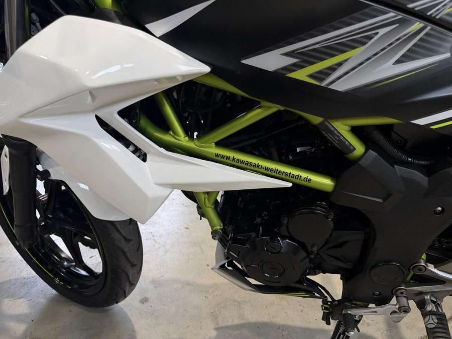 White Kawasaki Z 2019 in Siauliai, with an engine capacity of 0.13 L and mileage of 33 thousand km for 1999 €, photo 20 on AUTOMOTO.COM.LV