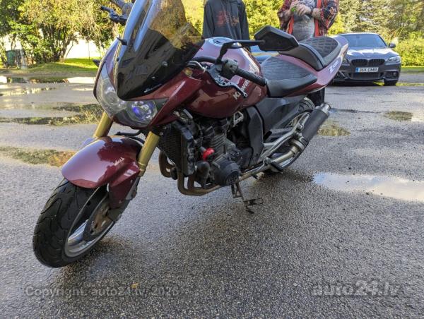 Red Kawasaki Z1000 2006 in Tallinn, with an engine capacity of 0.95 L and mileage of 30 thousand km for 4300 €, photo 2 on AUTOMOTO.COM.LV