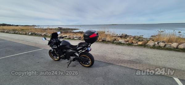 Black Kawasaki Z750 2005 in Tallinn, with an engine capacity of 0.75 L and mileage of 66 thousand km for 2500 €, photo 2 on AUTOMOTO.COM.LV