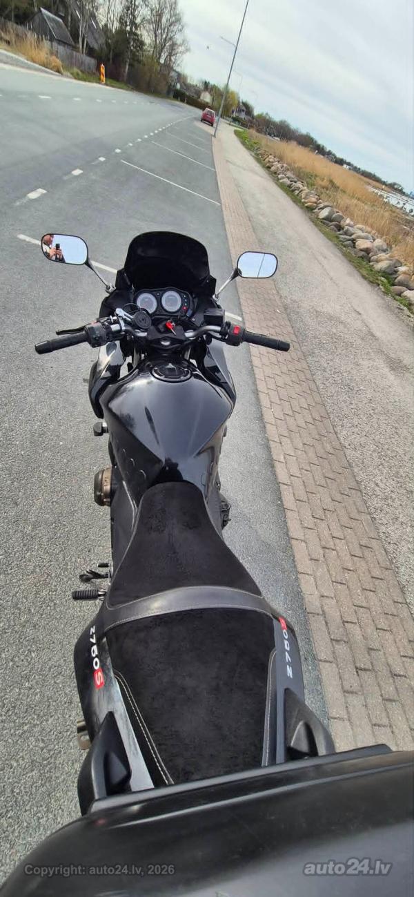Black Kawasaki Z750 2005 in Tallinn, with an engine capacity of 0.75 L and mileage of 66 thousand km for 2500 €, photo 4 on AUTOMOTO.COM.LV