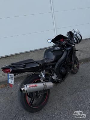 Melns Kawasaki Zx-6R 1999 Kauņa, ar dzinēja tilpumu 0.60 L un nobraukumu 40 tūkst. km par 1250 €, foto  vietnē AUTOMOTO.COM.LV